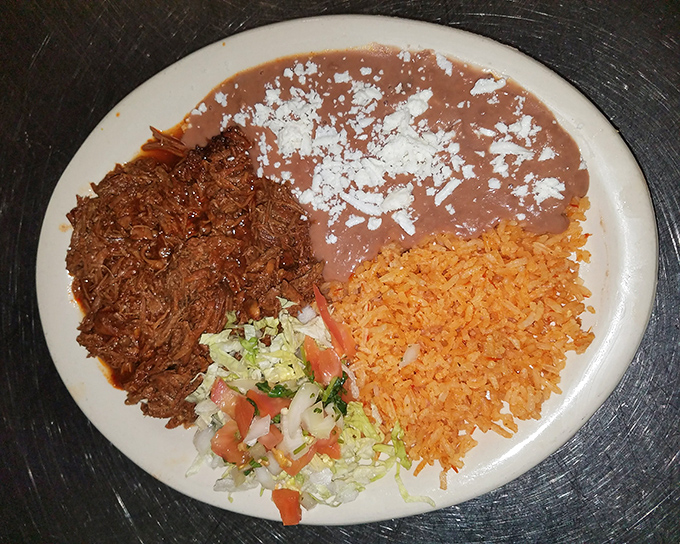 A plate that answers the eternal question: "How much deliciousness can you fit in one dish?" Machaca, beans, rice, and fresh pico create edible harmony.