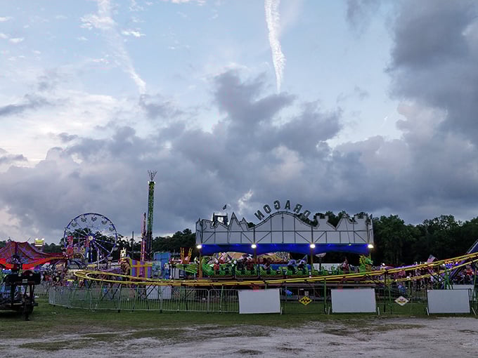 The Hernando County Fair lights up against twilight skies, bringing carnival magic to Brooksville's rural charm.