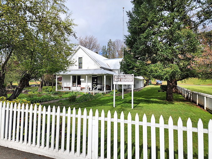 The Highland Art Center's white picket fence isn't just for show&mdash;it frames a community hub where creativity thrives far from urban galleries.