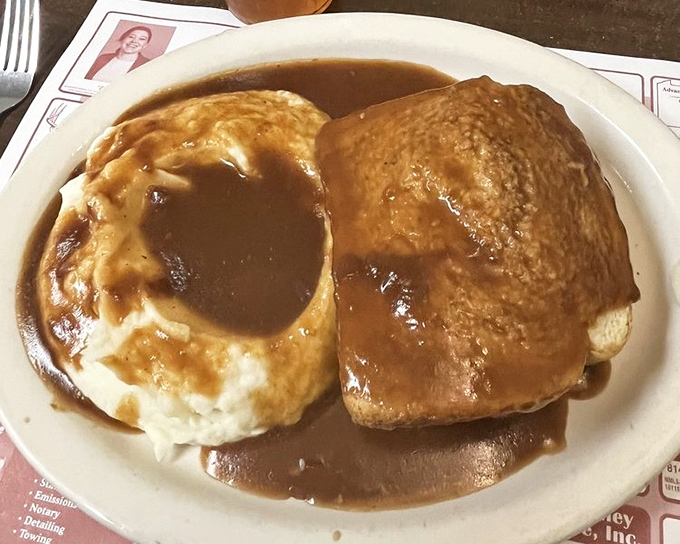 Hot beef sandwich that makes you question why you ever eat anything else. Tender meat, soul-satisfying gravy, and mashed potatoes that could make a grown man weep.