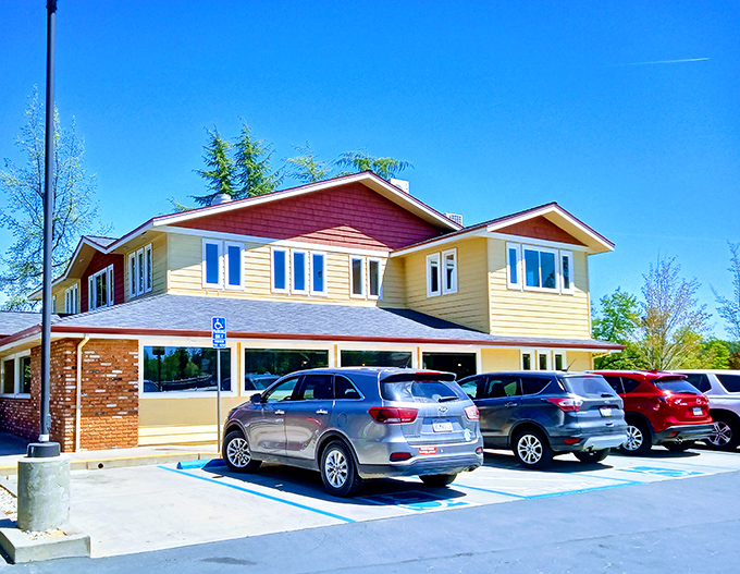Humpty Dumpty Kitchen's cheerful yellow exterior promises the kind of hearty breakfast that fuels small-town adventures and nap-worthy afternoons. 