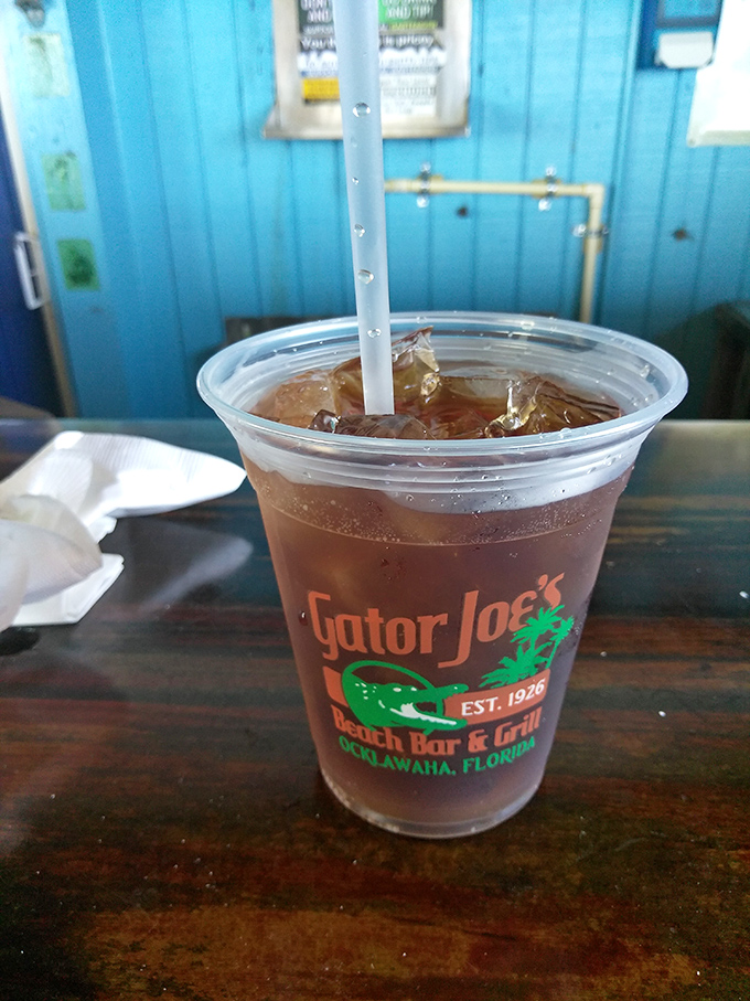 Sweet tea in a Gator Joe's cup—the unofficial state beverage of Florida that hydrates conversations and cools spicy bites.