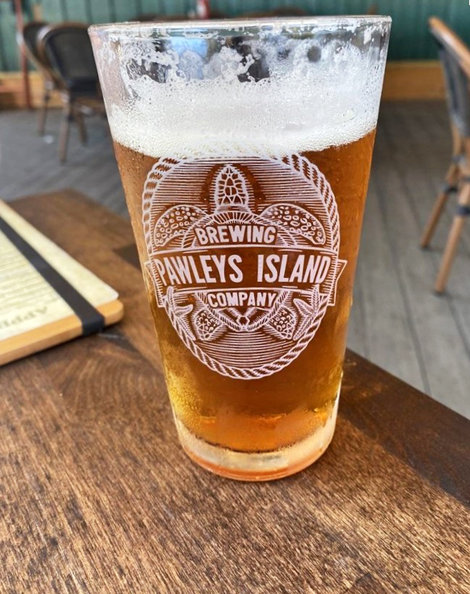 A perfectly poured local brew with just the right amount of foam. Because sometimes the best seafood wingman comes in liquid form.