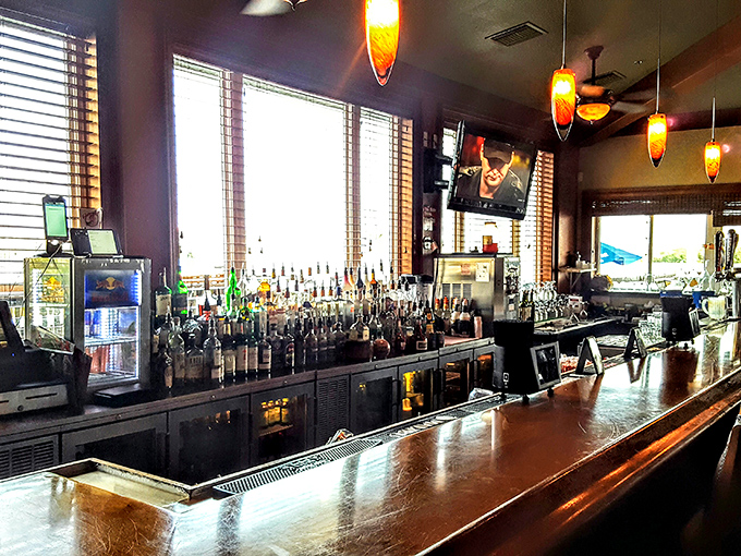 A bar stocked for serious business. This is where tropical cocktails are born and inhibitions begin their afternoon vacation.