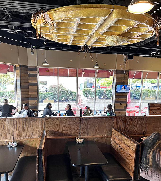 That waffle ceiling installation deserves its own Ohio arts grant &ndash; practical decor that reminds you exactly why you came.