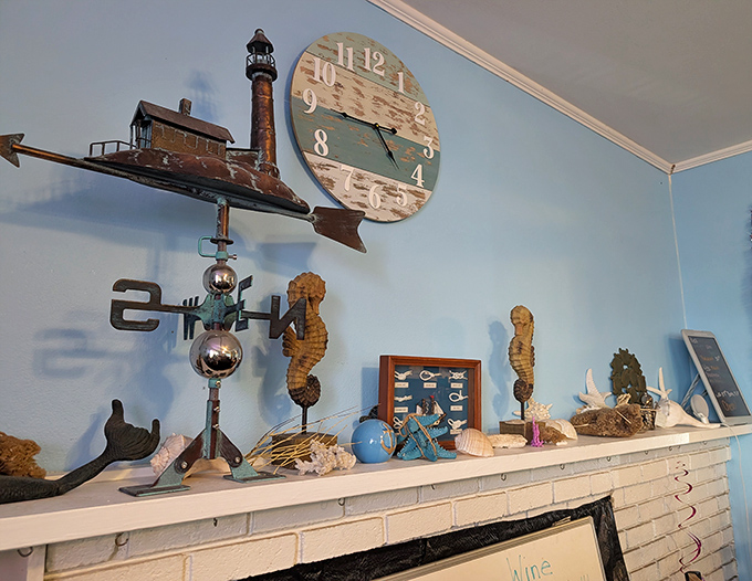 Coastal kitsch done right&mdash;a mantel adorned with the treasures of the sea, where every seahorse and lighthouse has earned its place.