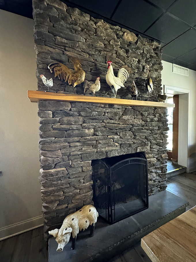The stone fireplace crowned with rooster figurines adds farmhouse charm. In barbecue, as in life, it's the unexpected touches that make a place memorable.