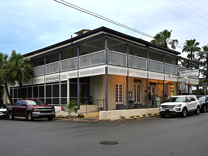 The Island Hotel has stood sentinel on this corner since 1859, watching fashions change while its timeless hospitality remains.