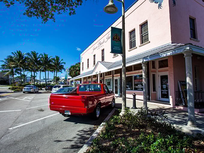 The pink façade of Jensen Beach Inn whispers "Old Florida charm" without shouting "trapped in a time warp." Vintage vibes, modern comforts.