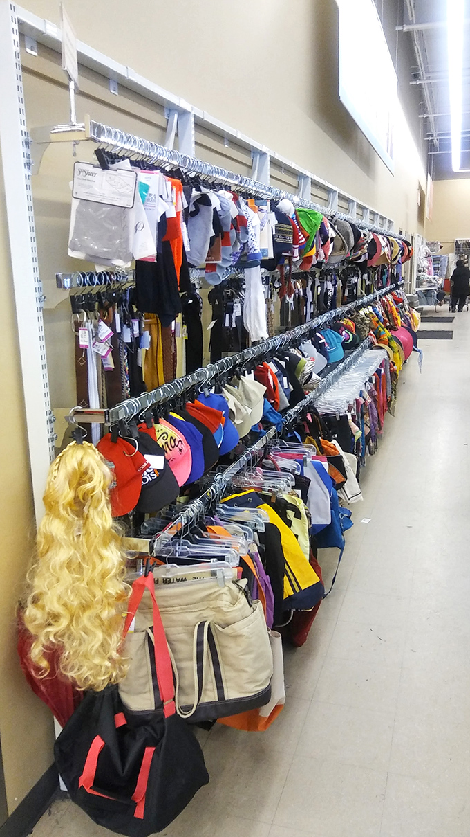 Accessories galore! From blonde wigs to baseball caps, this wall of personality enhancers proves one person's costume is another's signature look.