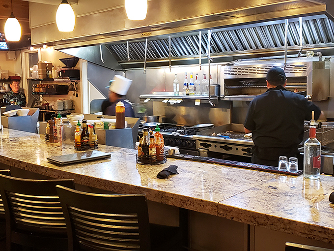 Where the magic happens—a glimpse into the bustling kitchen where seafood transforms from ocean treasure to plate perfection.