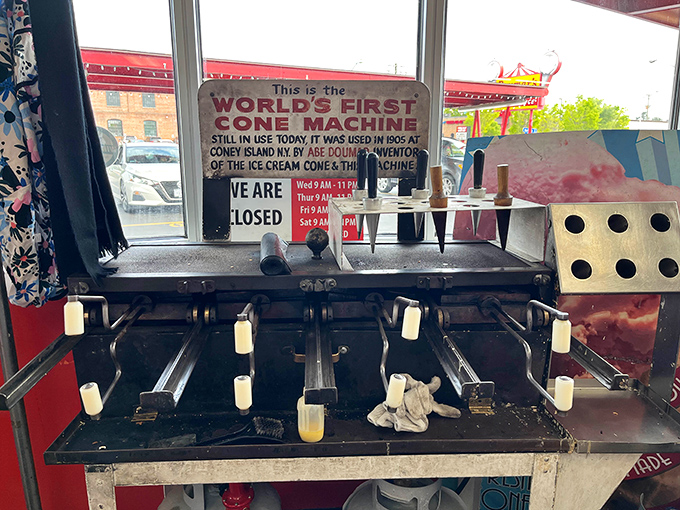 That sign says it all: "World's First Cone Machine." Not just serving history&mdash;they're making it, one waffle cone at a time.