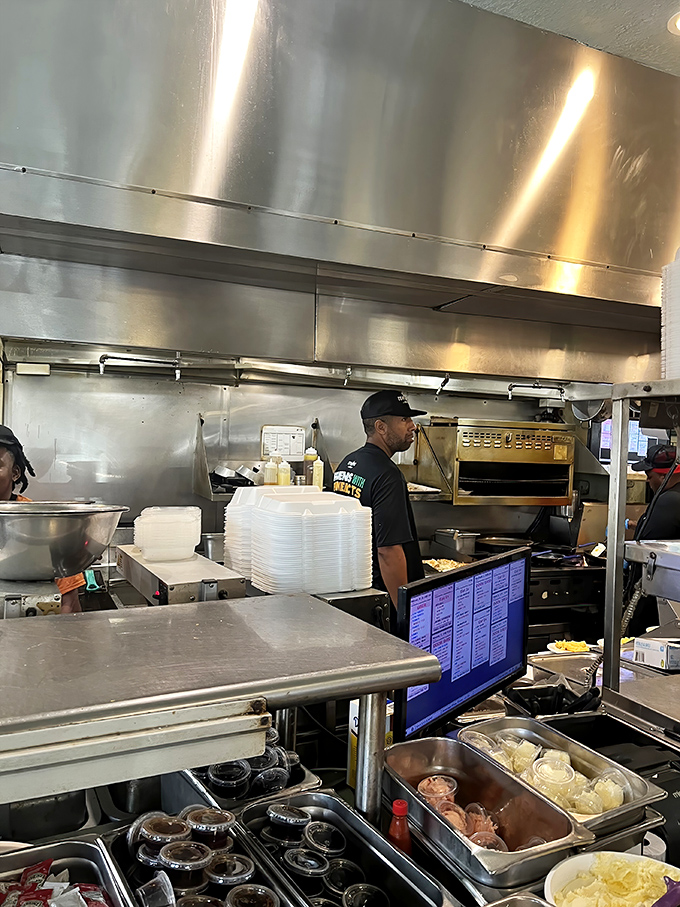 Kitchen choreography in action. The dance of short-order cooking is a beautiful thing to behold&mdash;especially when chicken and waffles are the end result.