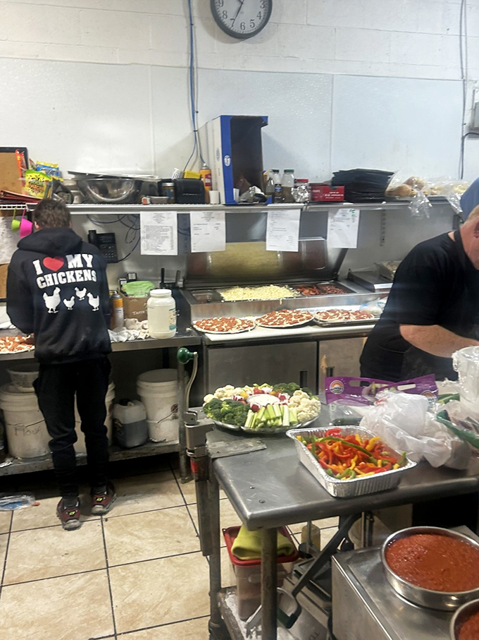 Behind-the-scenes magic happens where passionate cooks create their crispy chicken masterpieces daily.