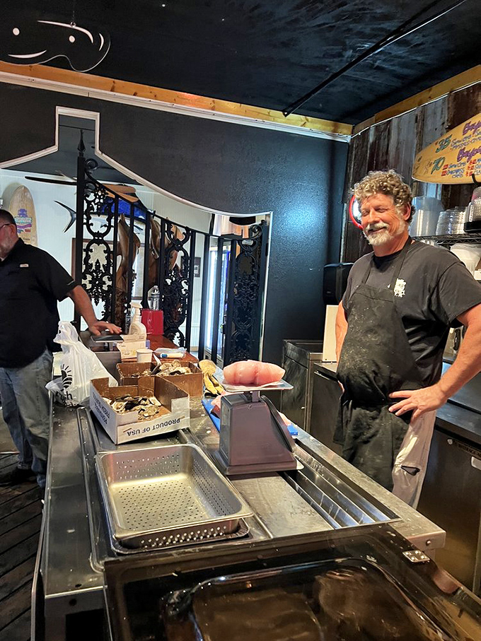 Behind the scenes where seafood magic happens. The kitchen crew treats Florida's bounty with the respect it deserves.
