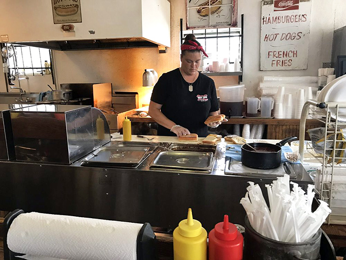 The open kitchen concept existed long before it was trendy&mdash;here it's about efficiency, not showing off fancy knife skills.