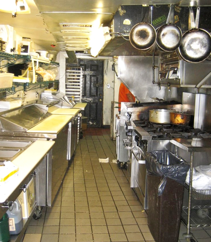 The kitchen where the magic happens. Small space, big flavors&mdash;like a culinary TARDIS that's bigger on the inside.
