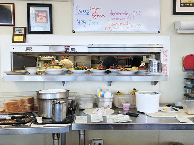 The pass-through window offers a glimpse of culinary magic. Homemade cinnamon rolls and Key lime pie &ndash; because vacation requires proper fuel.