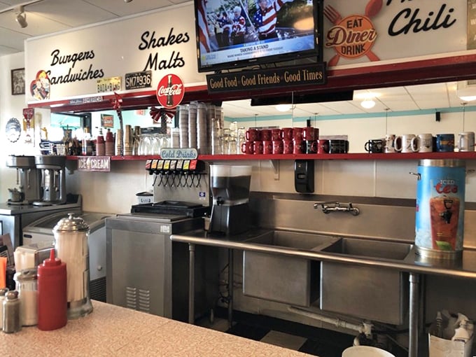 Behind the counter magic happens &ndash; where milkshakes are born, burgers are flipped, and the soda fountain stands ready to fulfill your fizzy dreams.