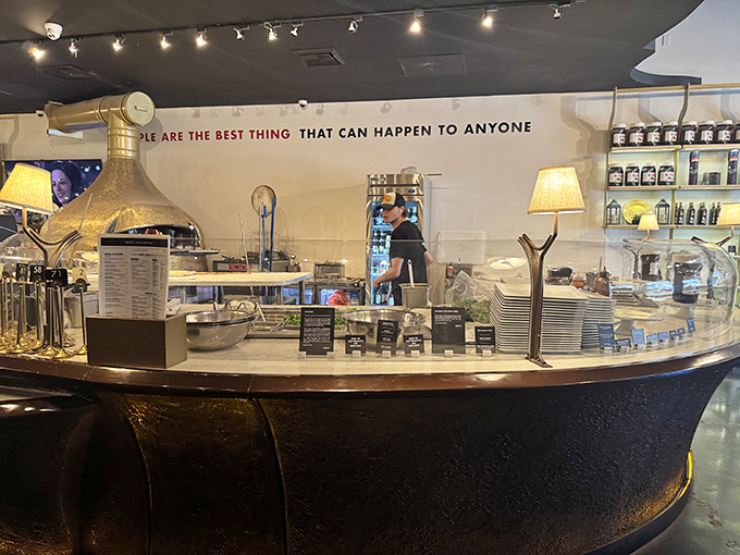 "People are the best thing that can happen to anyone" reads the wall. Second best? Watching your pizza being crafted before your eyes.