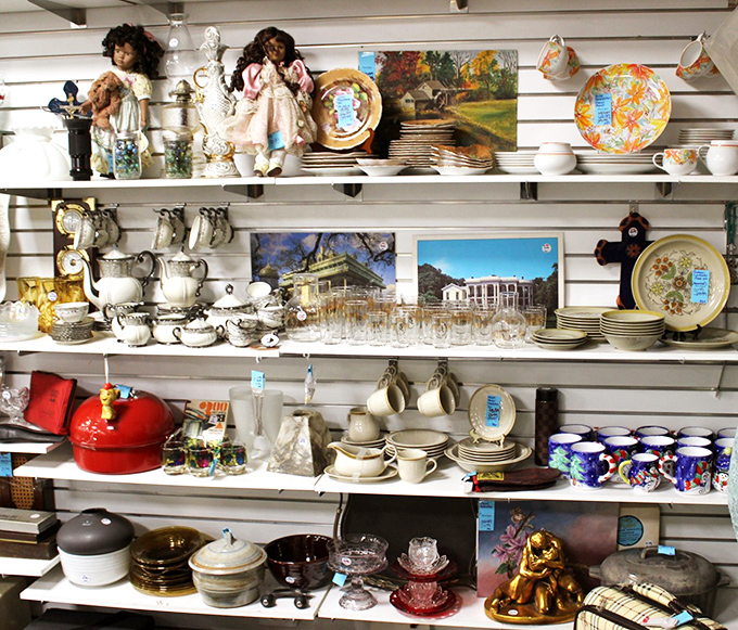 Porcelain treasures and vintage kitchenware that would make your grandmother nod with approval. That gold figurine is pure kitsch magic!