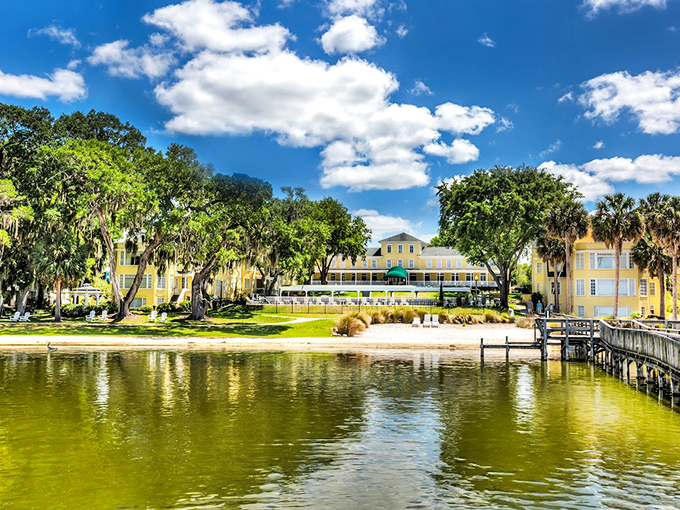The historic Lakeside Inn glows golden against blue skies, offering a glimpse of Old Florida elegance that's increasingly rare in the Sunshine State.