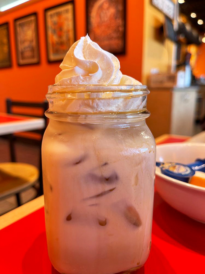 A lavender latte that looks like a cloud in a mason jar. Coffee meets art meets comfort in one photogenic package.