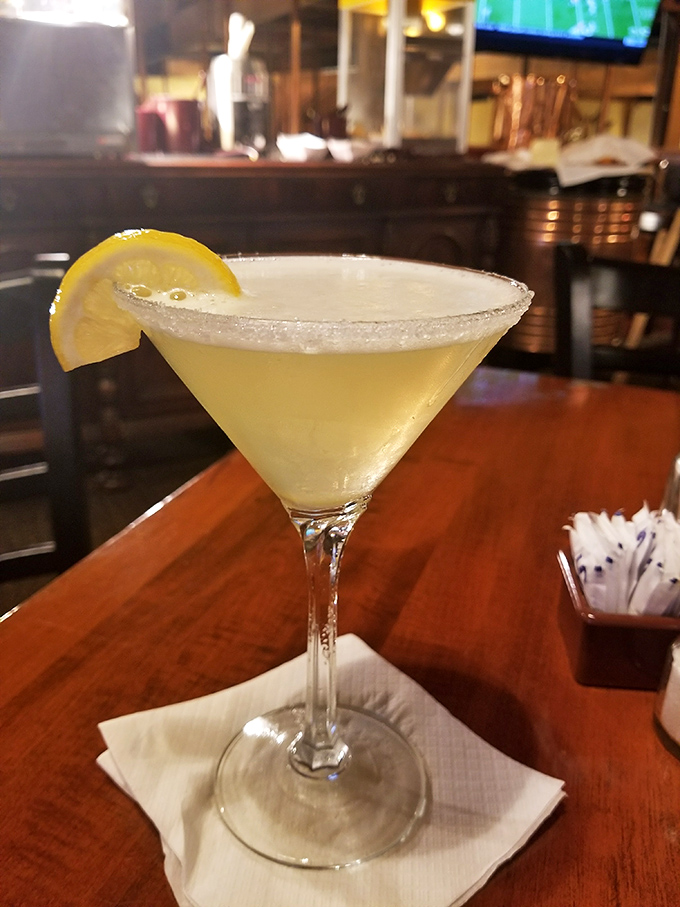 The lemon drop martini arrives like liquid sunshine in a glass, its sugar-rimmed edge promising the perfect balance of sweet and tart.