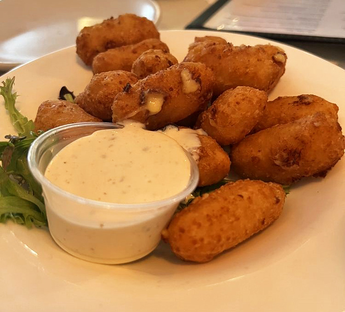 These mac and cheese bites aren't just appetizers&mdash;they're what happens when comfort food decides to dress up and go somewhere fancy.