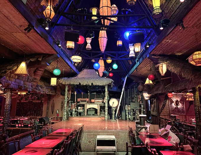 The stage awaits its performers beneath a constellation of colorful lanterns. Soon fire dancers will make you forget you're in Florida.