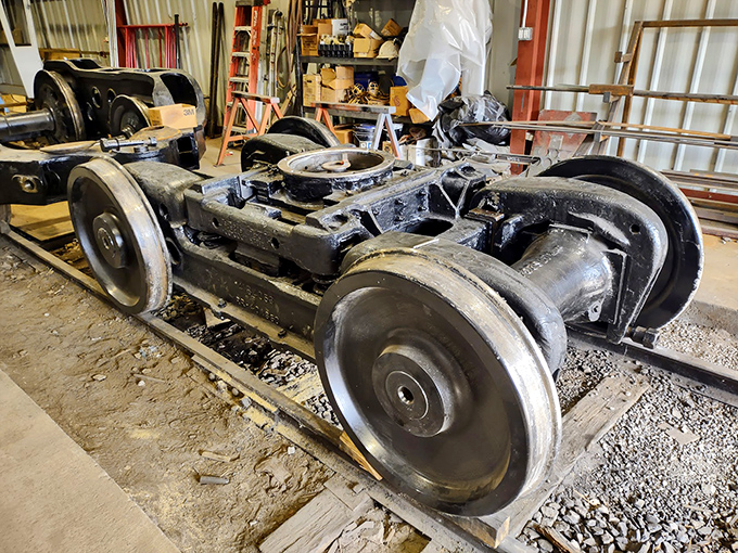 Raw mechanical poetry &ndash; the exposed undercarriage of a train reveals the industrial ballet that makes locomotion possible.