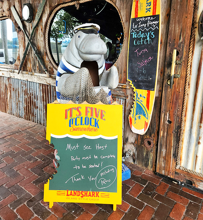 Even the manatee statue knows it's five o'clock somewhere&mdash;a whimsical reminder that vacation rules apply at The Lazy Flamingo.
