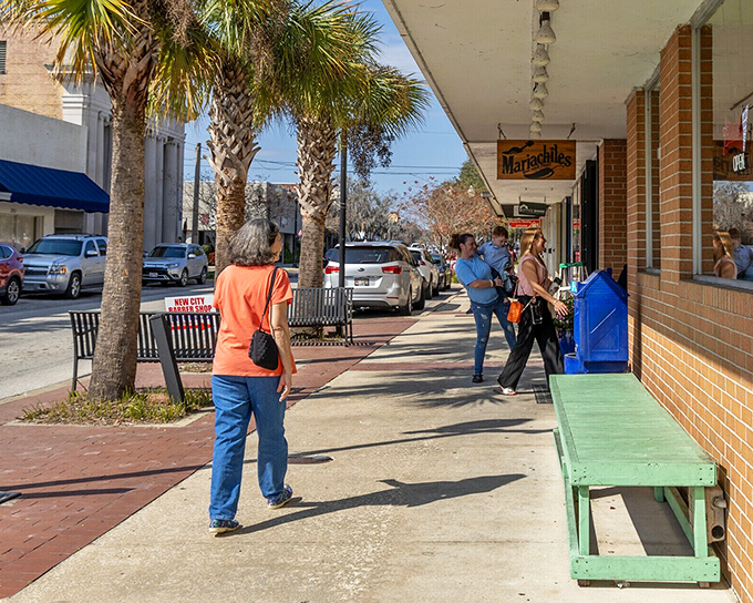 Downtown sidewalks where neighbors still stop to chat, proving the best social network doesn't require Wi-Fi or monthly subscription fees.