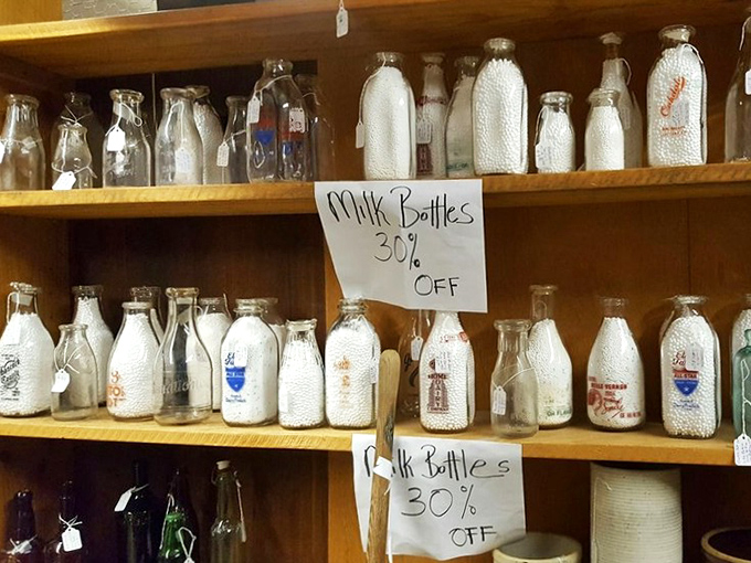 A dairy devotee's dream display&mdash;these vintage milk bottles recall mornings when delivery meant the clink of glass on porches.