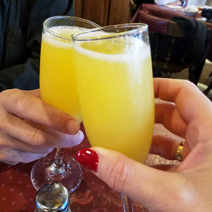 Bubbly mimosas add a touch of celebration to any weekend brunch gathering here.