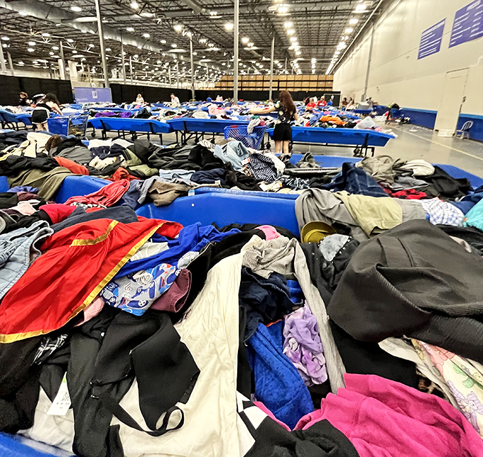 Behind the scenes: the organized chaos of donations being sorted before they make their grand entrance onto the sales floor.