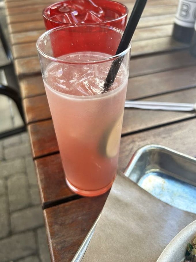 Pink drinks that don't apologize for being pretty. These refreshing cocktails cut through barbecue richness like a cool breeze on a summer day.