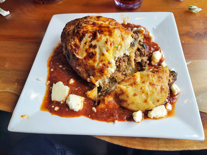 Traditional moussaka layers comfort and flavor like a warm Mediterranean hug on your dinner plate.