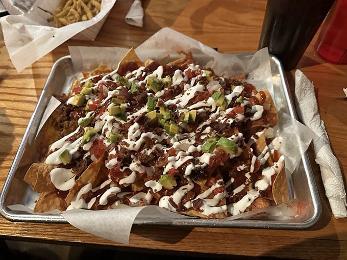 These loaded nachos aren't just a shareable appetizer&mdash;they're a topographical marvel of peaks, valleys, and delicious archaeological layers waiting to be excavated.
