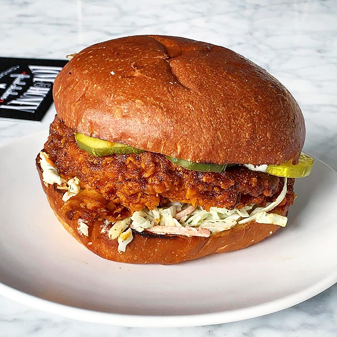 The Nashville Hot Chicken Sandwich&mdash;where pleasure and pain find perfect harmony. Those pickle chips aren't just garnish; they're survival equipment.
