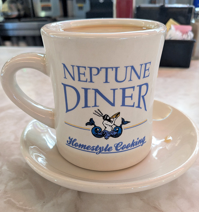 This isn't just a coffee mug&mdash;it's a vessel of liquid motivation adorned with Neptune's signature sea god, ready to jumpstart your morning.