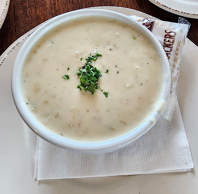 Clam chowder so creamy it should come with a warning label. New England's finest export, served with crackers that know their place in the world.