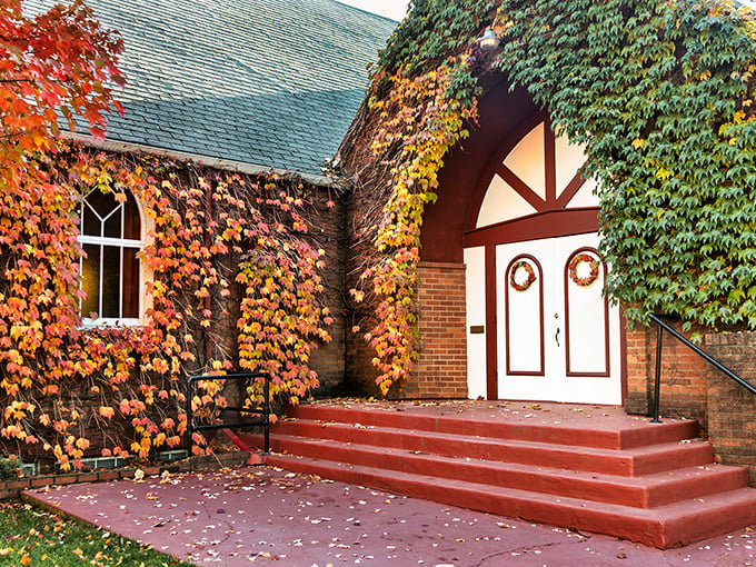 Fall paints this historic church in fiery autumn colors, its ivy-covered walls and welcoming steps inviting visitors to pause and reflect.