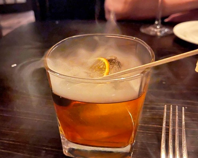 That's not just an Old Fashioned&mdash;it's time travel in a glass, complete with dramatic fog effect worthy of a Broadway entrance.