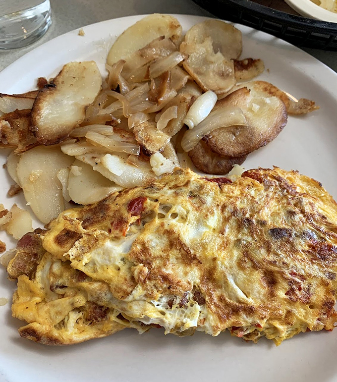An omelet that's been to the gym&mdash;robust, well-formed, and filled with enough good stuff to keep you full until dinner.