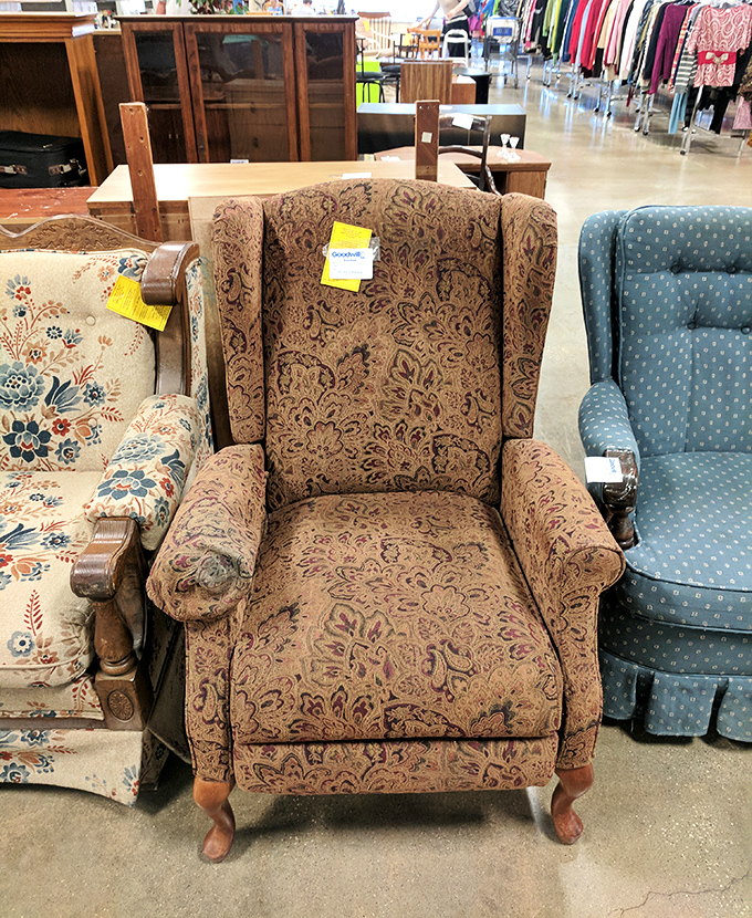 The chair lineup: a throne for every personality. That floral wingback has "cozy reading nook" written all over its well-preserved upholstery.