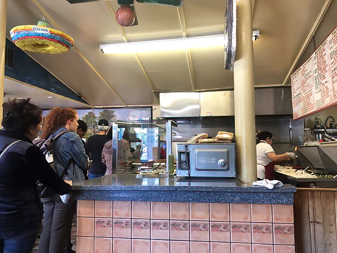 The front lines of flavor. Where dedicated cooks transform simple ingredients into edible art that keeps the neighborhood coming back.