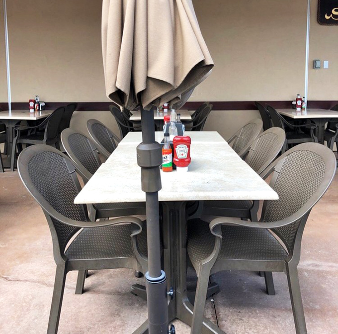 Outdoor tables with umbrellas offer prime real estate for enjoying ocean breezes while contemplating a second helping of chowder.