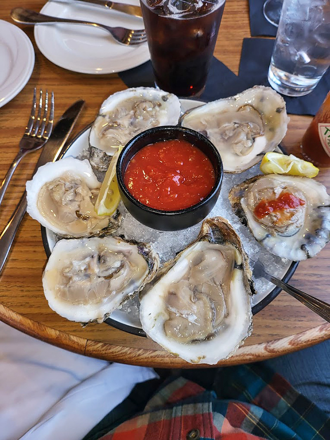 Fresh oysters arranged like a clock of deliciousness, with cocktail sauce as the centerpiece. Time stands still when seafood is this good