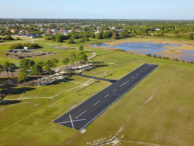 From this bird's-eye view, Port St. Lucie's thoughtful planning becomes apparent. That runway isn't for commercial jets—it's part of the city's recreational offerings for hobby enthusiasts.
